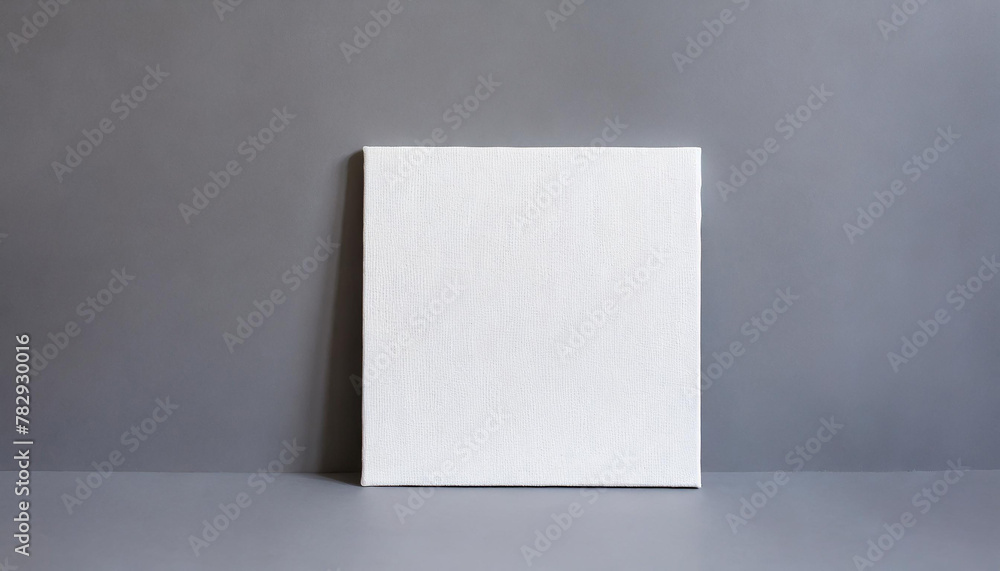 Mock-up of white square canvas on light gray background. Blank poster ...