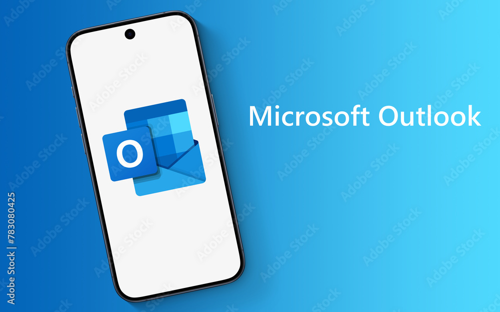 Outlook Logo is displayed on a modern smartphone, laying on a blue ...
