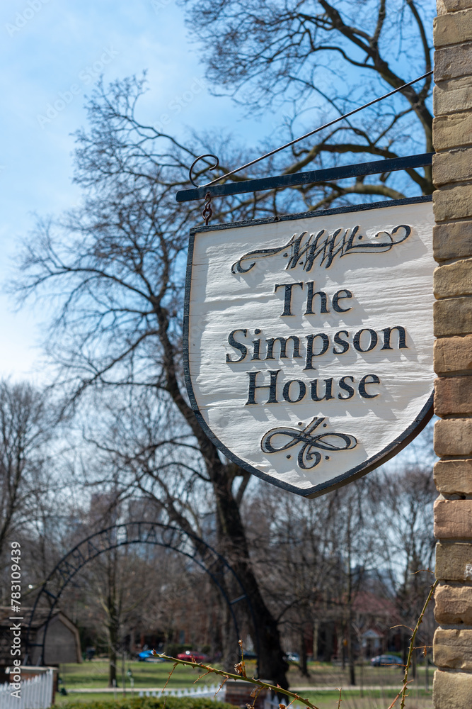 projecting sign outside The Simpson House at Riverdale Farm in Toronto ...