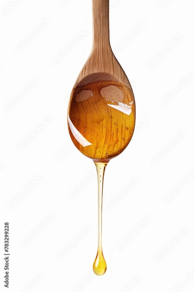 , highlighting the viscous texture and amber colour of the honey.A ...