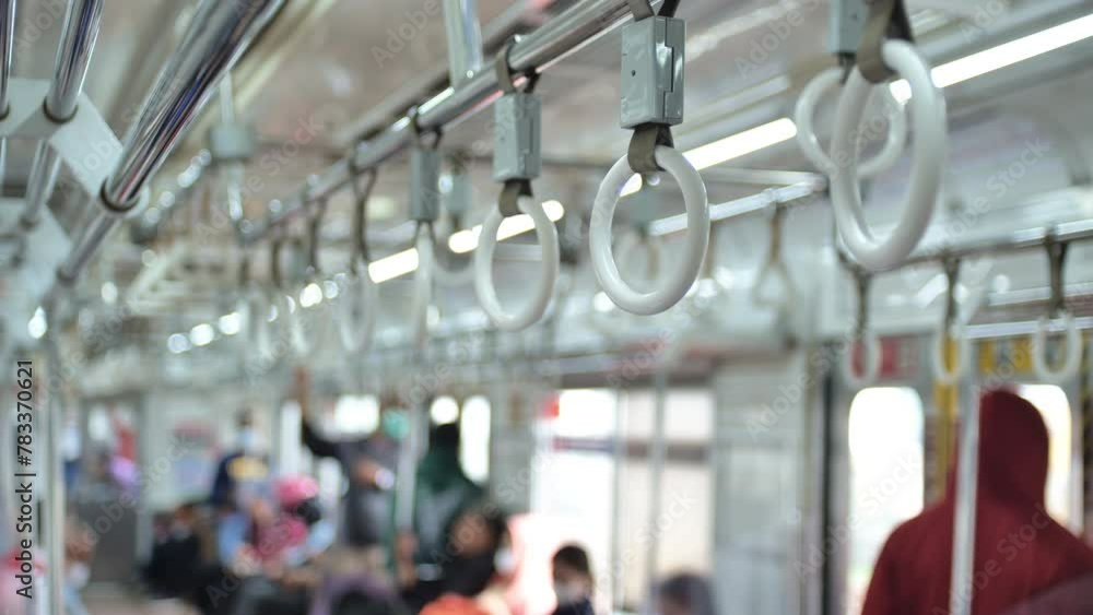 Handrails swaying while the Jakarta and Jabodetabek commuterline ...