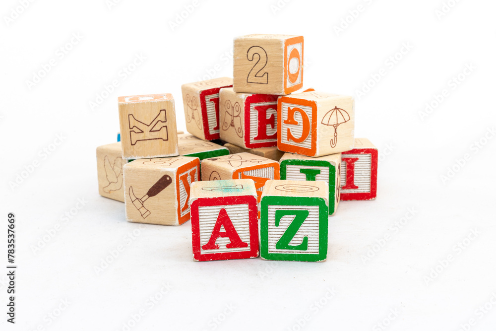 Wooden toy alphabet learning blocks. A and Z alphabets are focused with ...