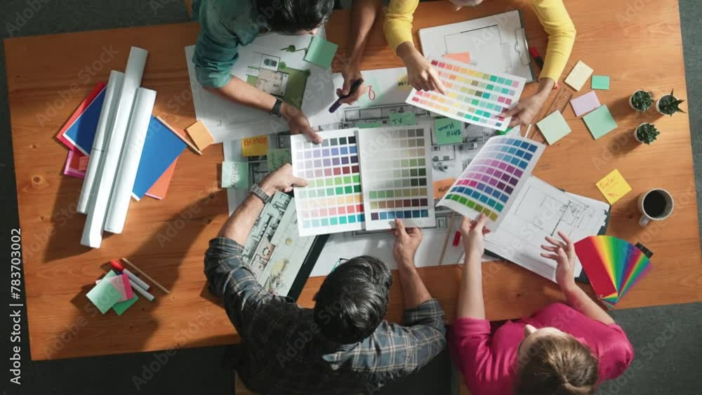 Top down aerial view of interior designer team choosing color from ...