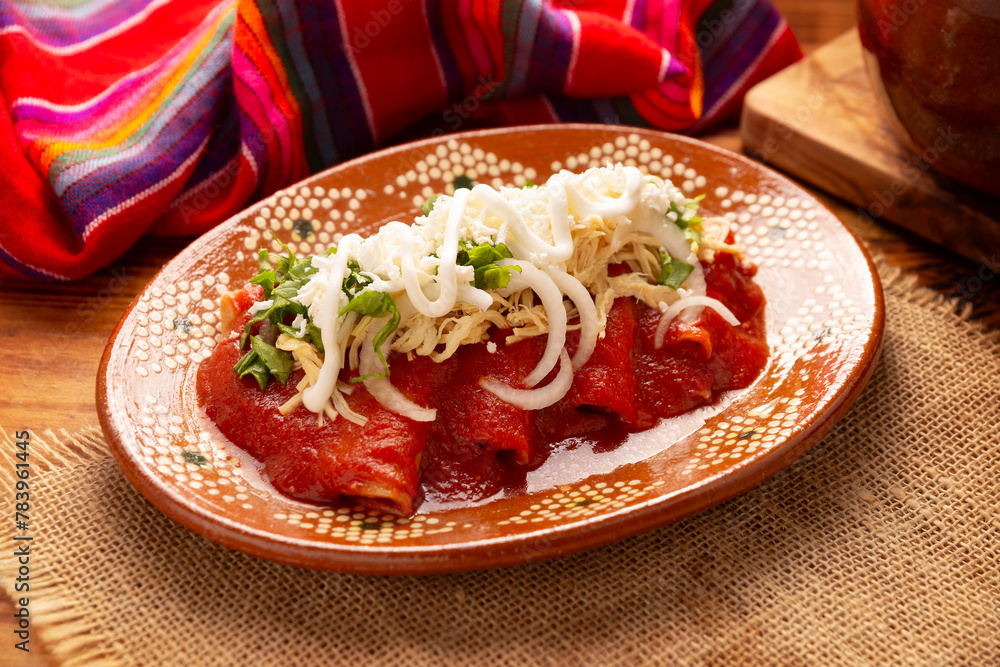 Entomatadas. Also known as Enjitomatadas, a typical dish of Mexican ...