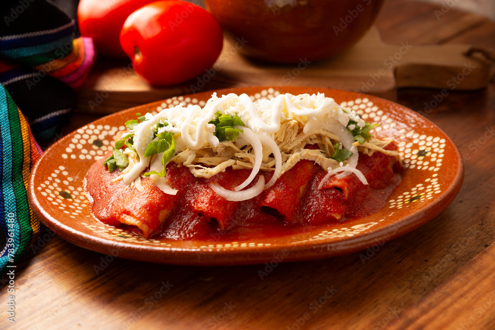 Entomatadas. Also known as Enjitomatadas, a typical dish of Mexican ...