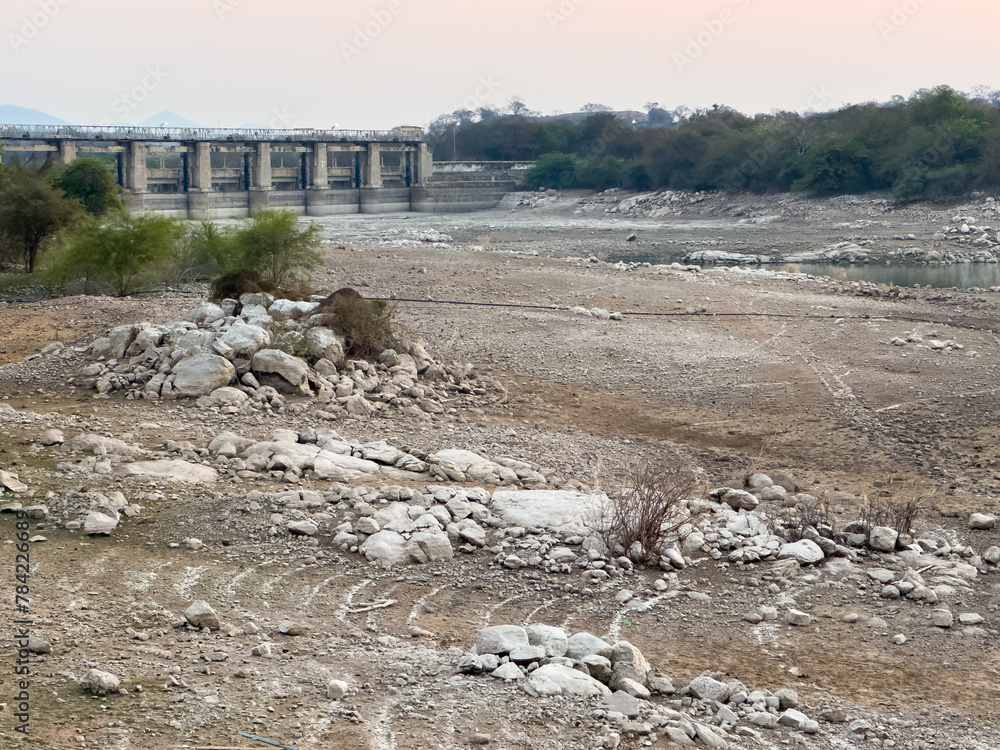 Dry river bed with sluice gates of Sathanur Dam which forms the ...