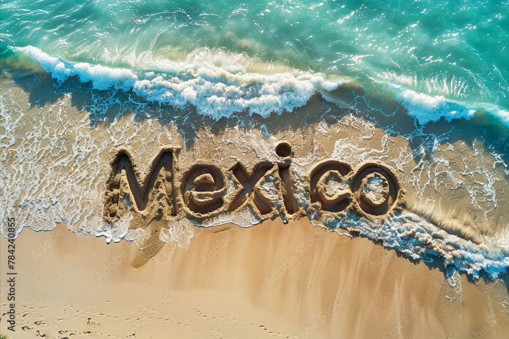 Mexico written in the sand on a beach. Mexican tourism and vacation ...