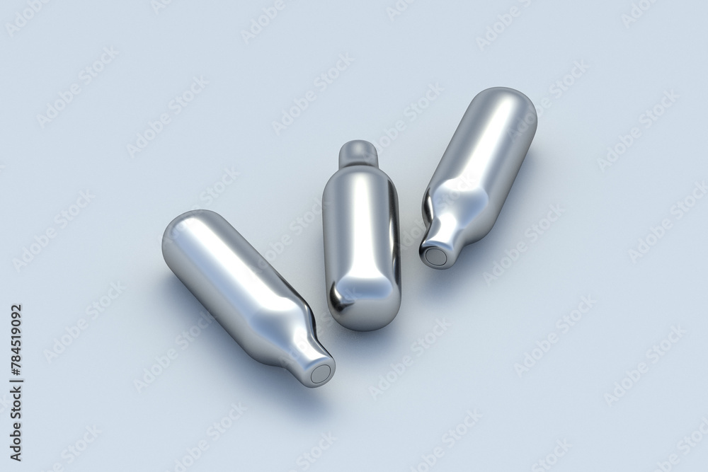 Scattered CO2 cartridges on gray background. Laughing gas. Metal tank ...