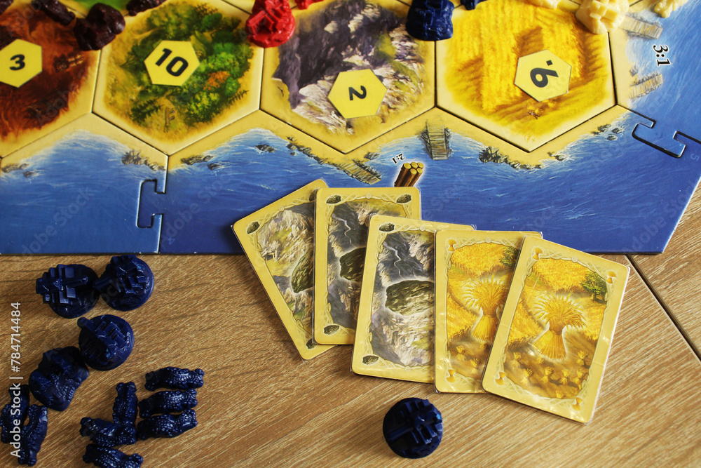 Mozyr, Belarus, April 01 2024: A catan board game buying a city ...