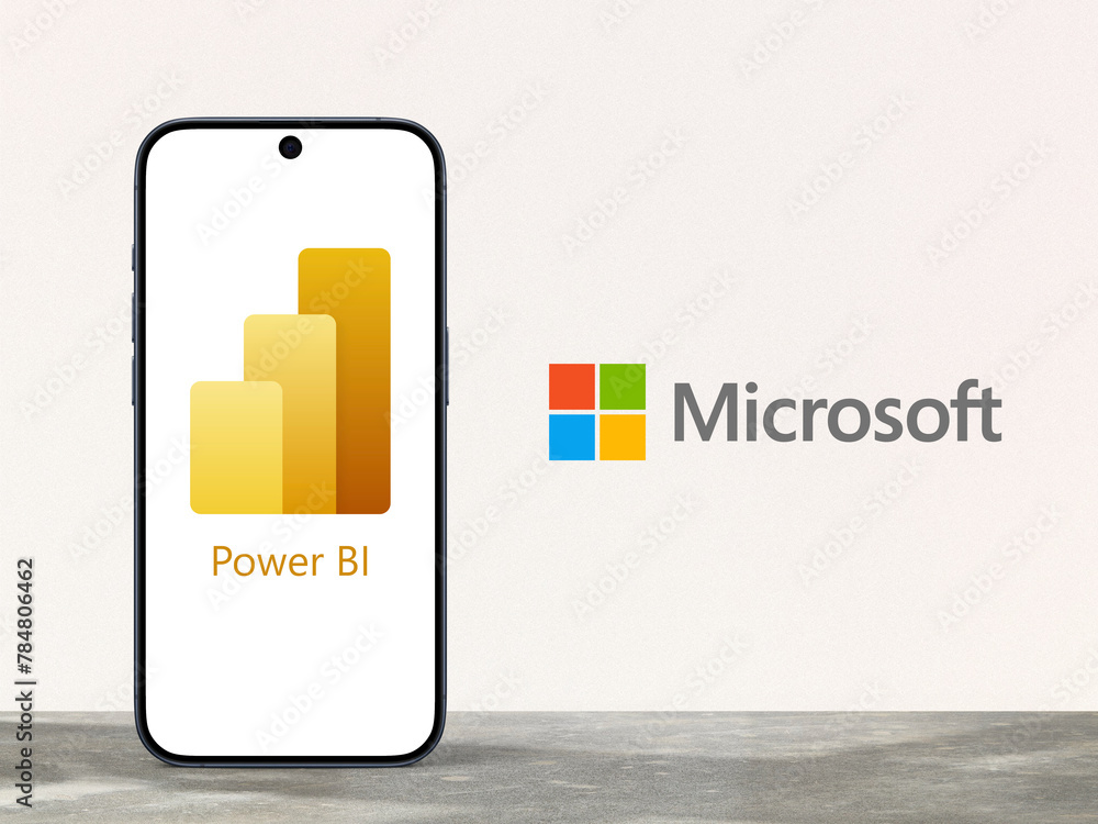 Microsoft Power Bi logo is displayed on a modern smartphone ...