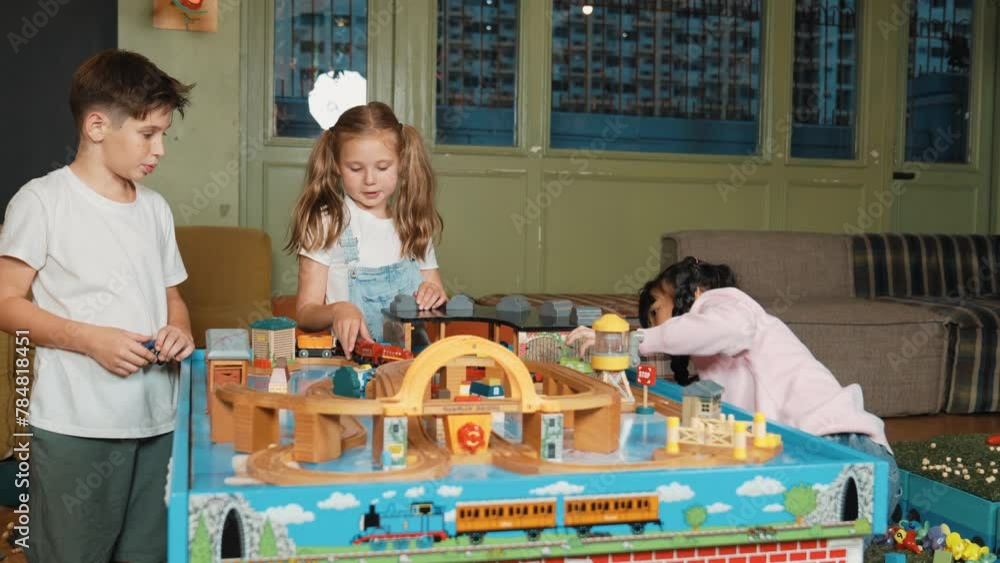 Multicultural girl playing toy to improve and develop creativity ...