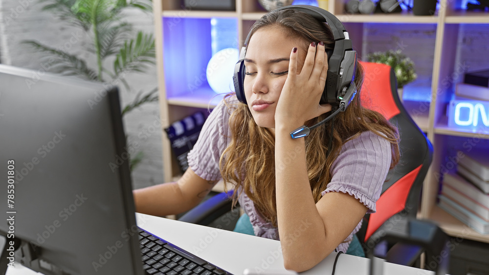 Tired young, beautiful hispanic woman streamer battling gaming fatigue ...