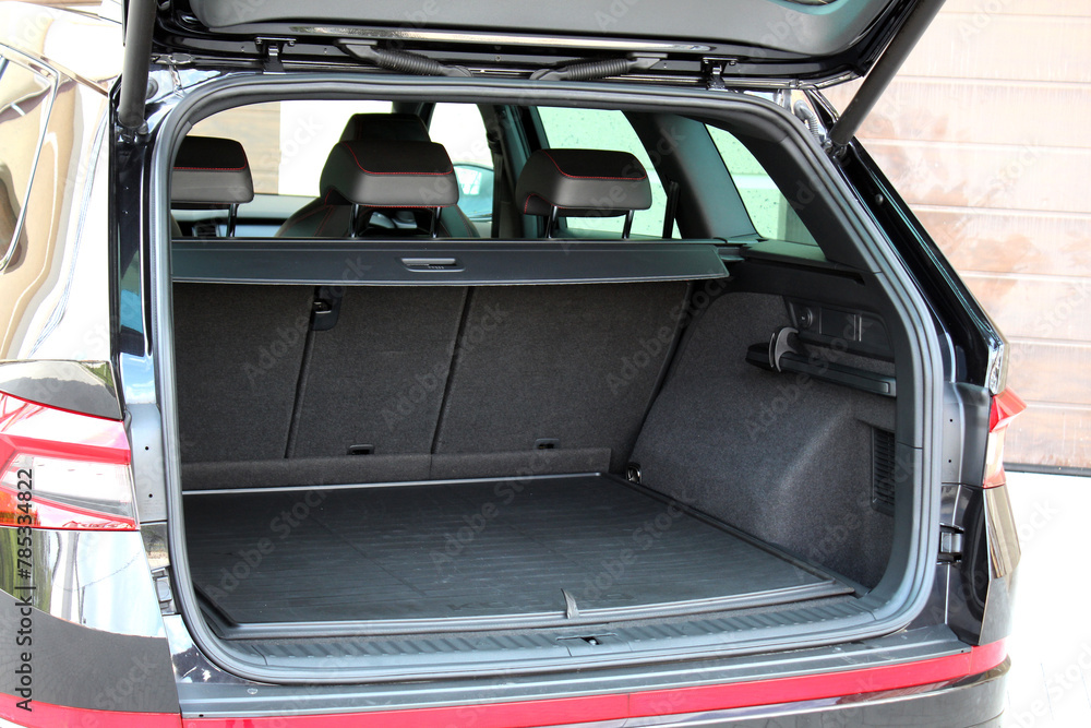 Car trunk. Clean trunk SUV car. Open back door modern SUV. The car is ...