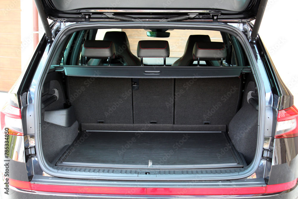 Car trunk. Clean trunk SUV car. Open back door modern SUV. The car is ready to load luggage ...