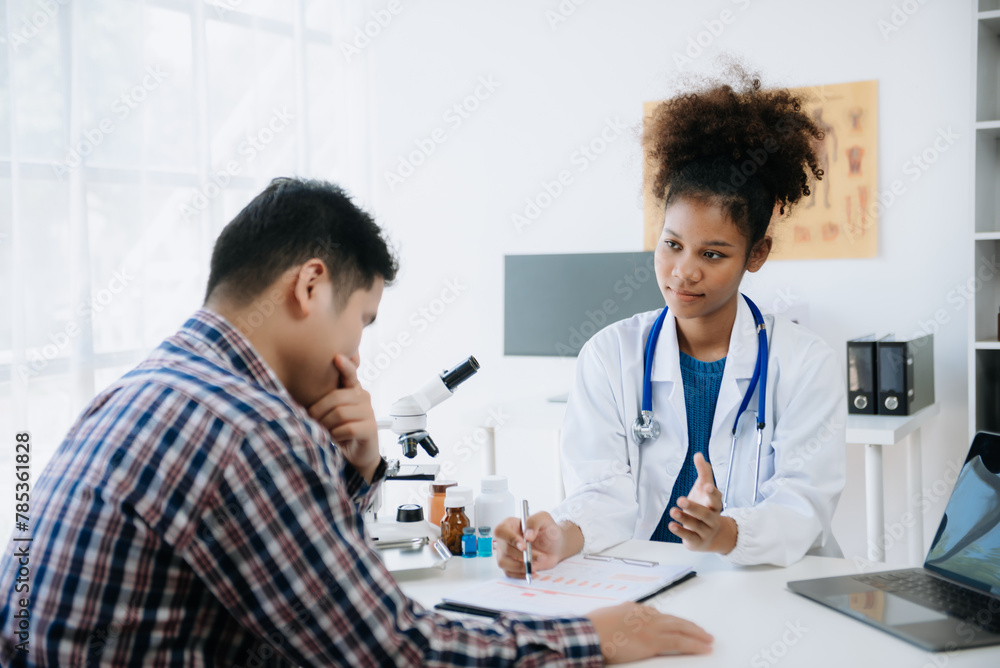 medical doctor holing patient's hands and comforting her.Kind doctor ...