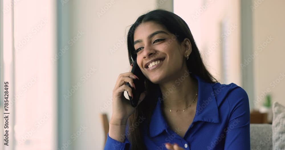 Beautiful 20s Indian girl enjoying telephone communication, mobile ...