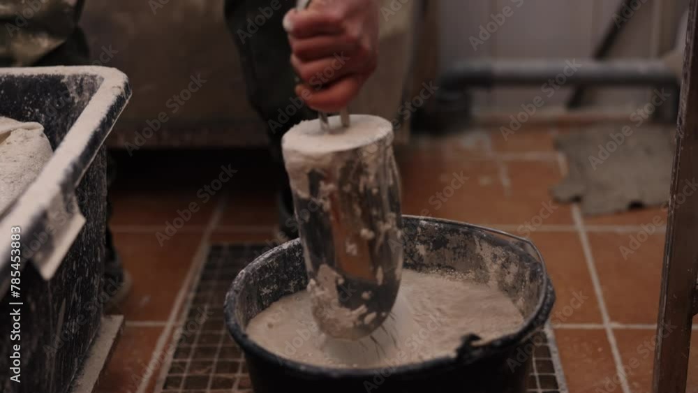 Plaster water, Model designing, Water techniques. Man is setting up ...