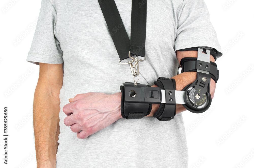 Man with a broken arm wearing in adjustable sling on white background ...