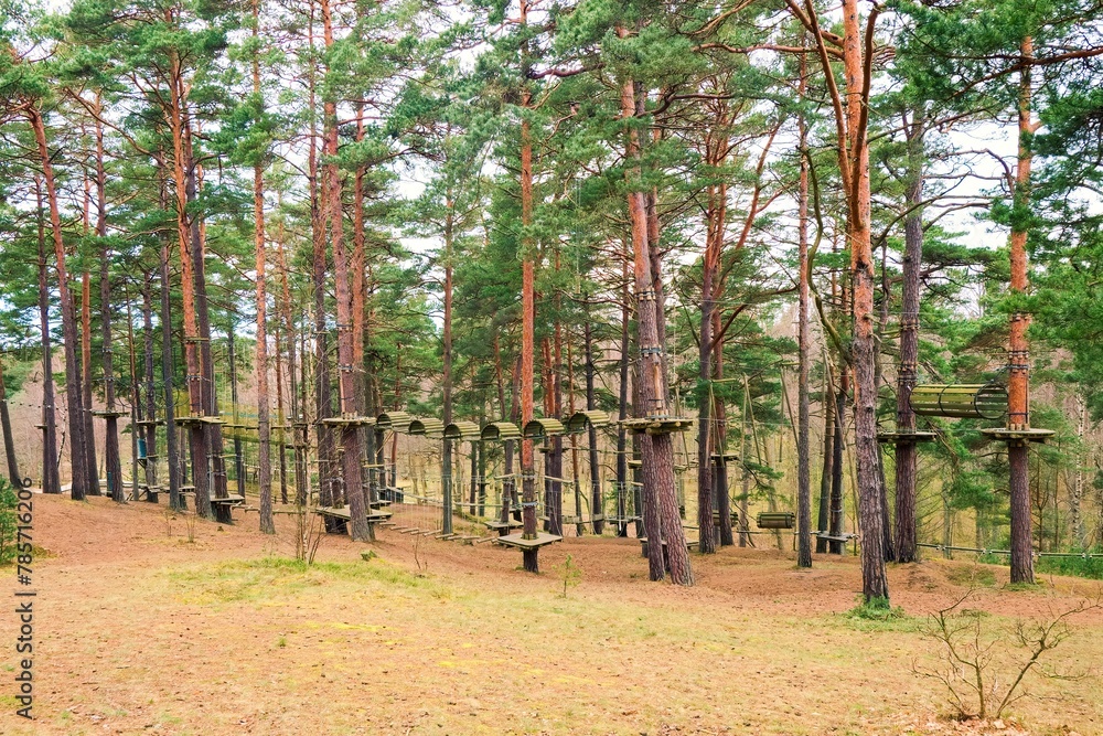 Adventure park for children - ropes, ladders, bridges in the forest ...