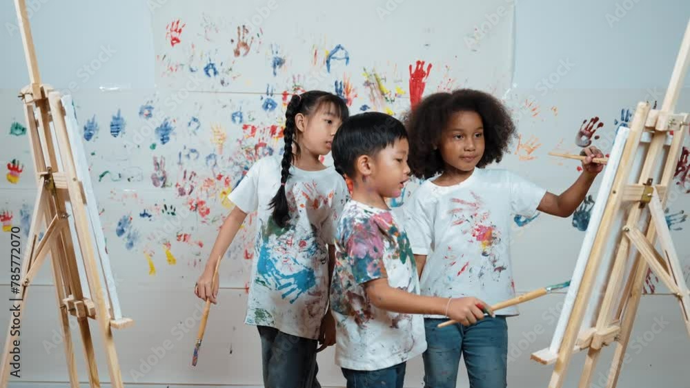 Diverse student painted or draw canvas at stained wall in art lesson ...