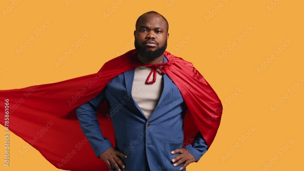 African american superhero flying with red cape, isolated over studio ...