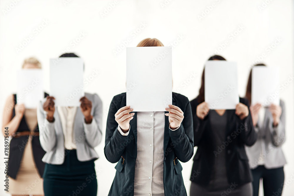 Businesswoman, staff and holding message on board in studio for ...
