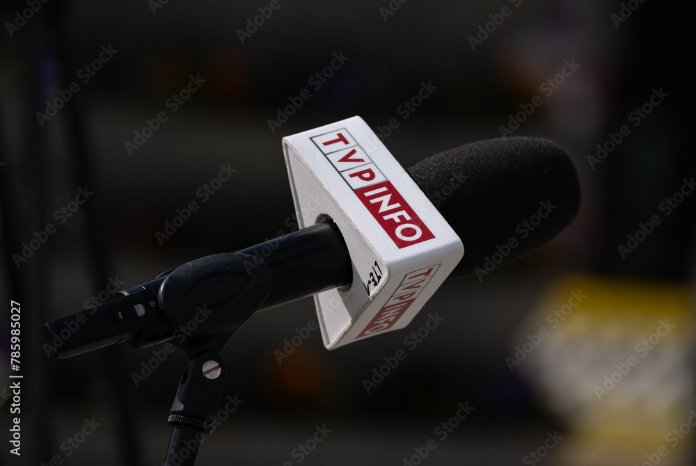 Microphone with logo sign of TVP Info television channel. Polish public ...