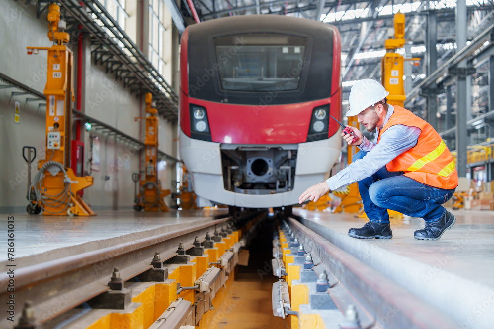 Electrical engineer railway in the maintenance station checking process ...