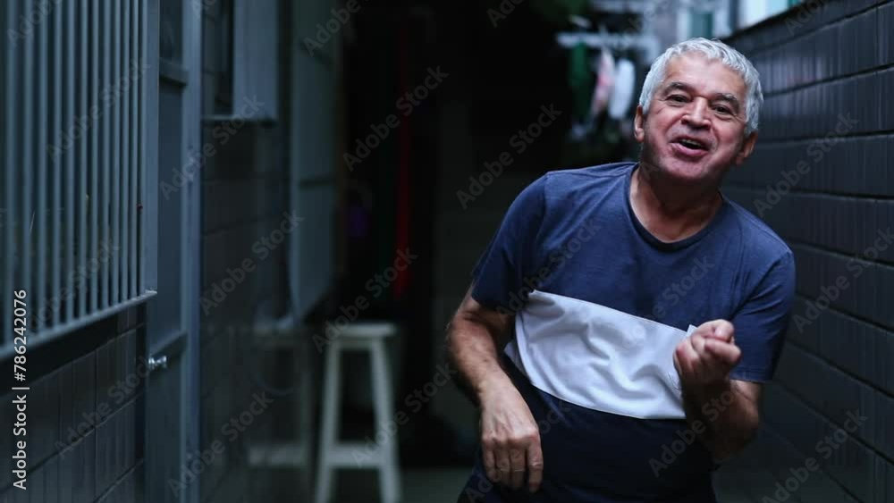 jubilant energetic senior happy man dancing in a carefree manner ...