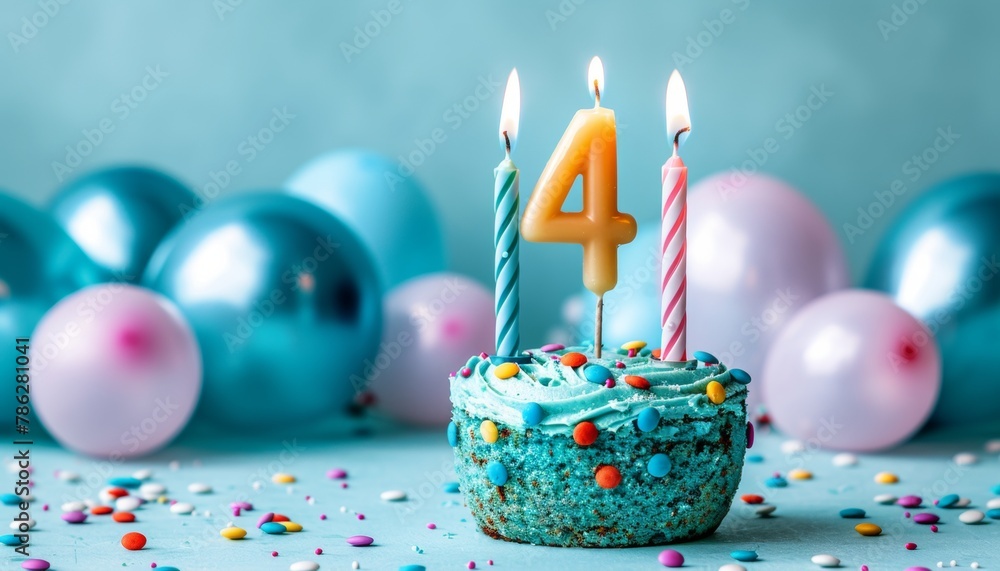 Celebratory cake with number four candle, balloons, and decor for 4th ...