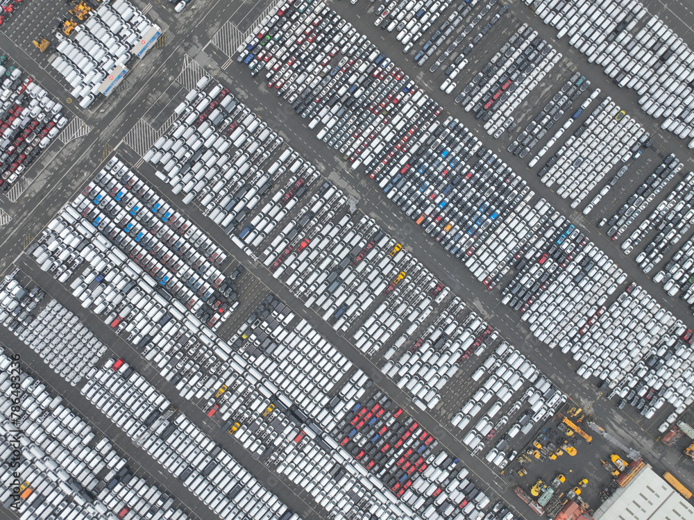 Aerial top down drone views of transportation of vehicles over seas ...