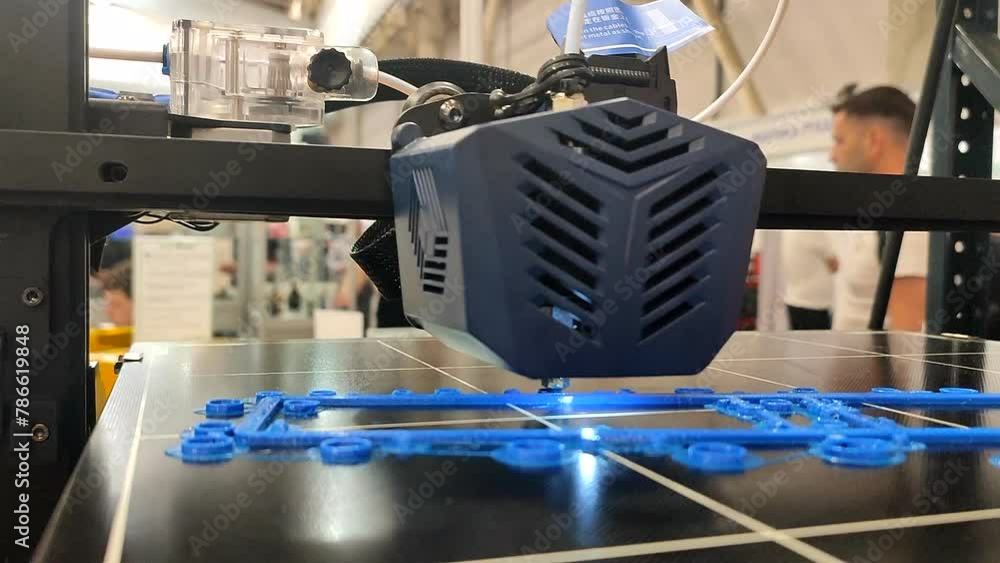 The process of printing an object on 3D printer from molten plastic. 3D ...