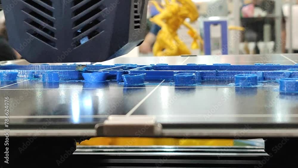 The process of printing an object on 3D printer from molten plastic. 3D ...