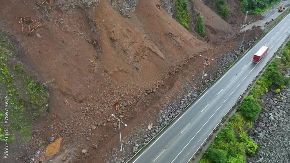 Mountain soil collapse in half of the highway. Landslides due to heavy ...