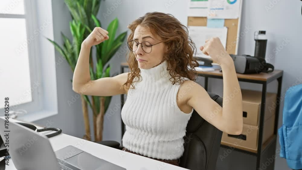 Radiant young woman beams with energy, confidently flexing her muscular ...