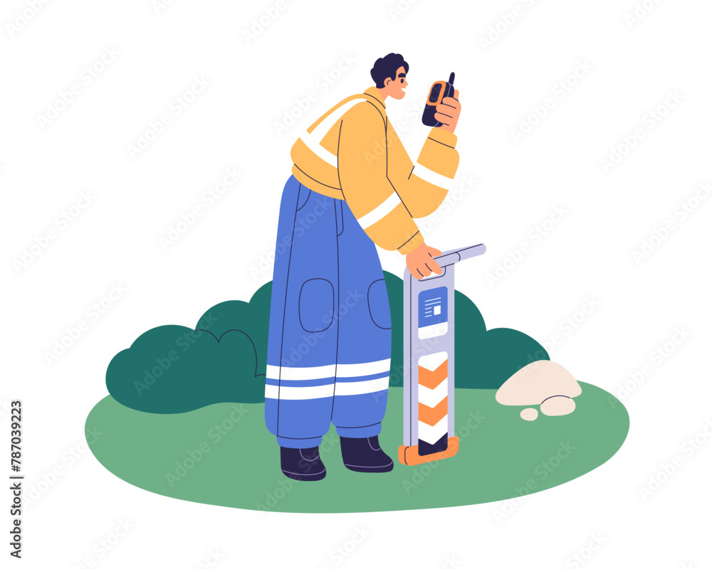 Surveyor engineer with surveying locator device. Worker inspecting ...