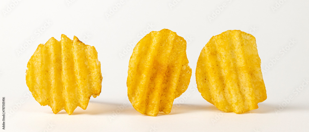 Three wavy chips on a white background with a cropped outline ...