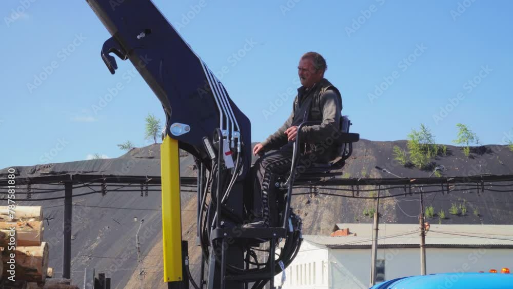 Worker Operating Industrial Crane Machine To Stack Timber For ...