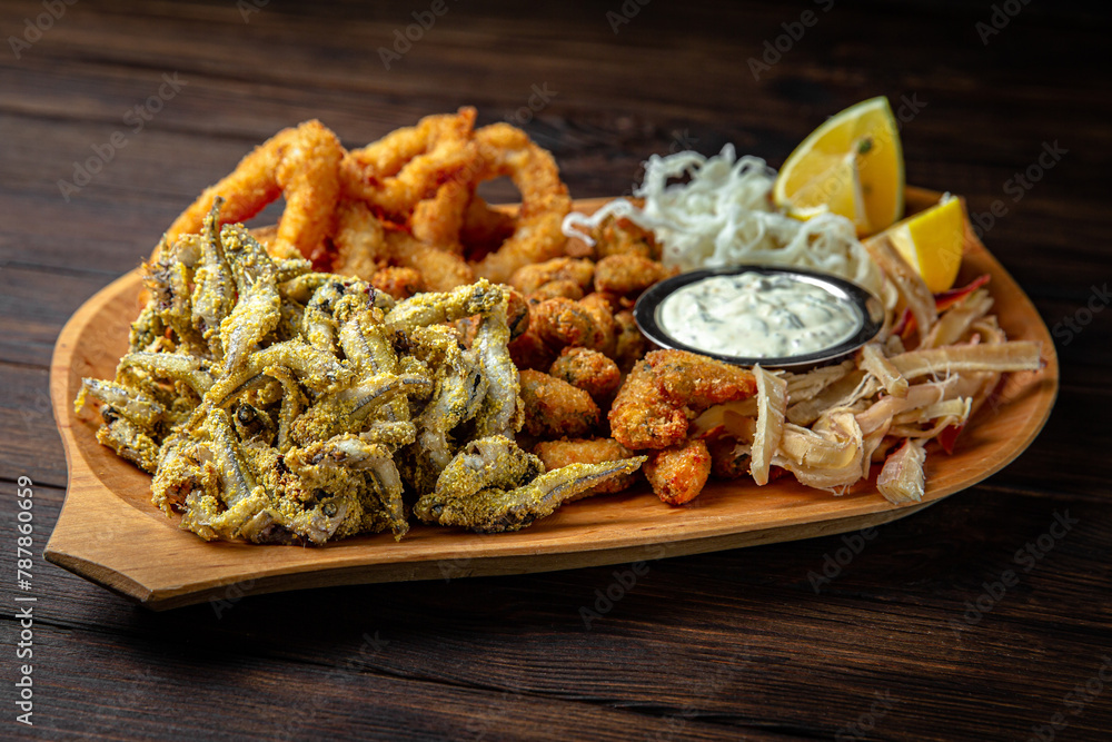 Plateau for a large company with different kinds of fish appetizers ...