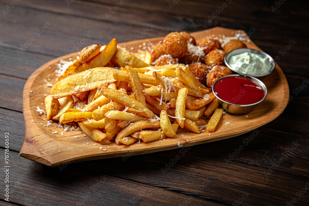 Plateau for a large company with different types of potatoes: sticks ...