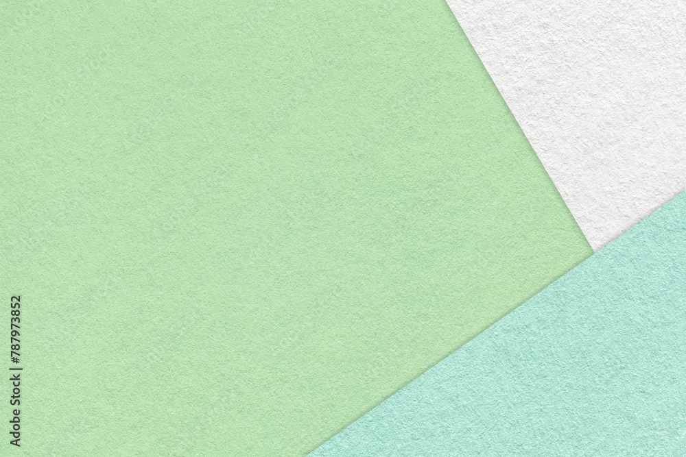 Texture of craft light green color paper background with white and cyan ...