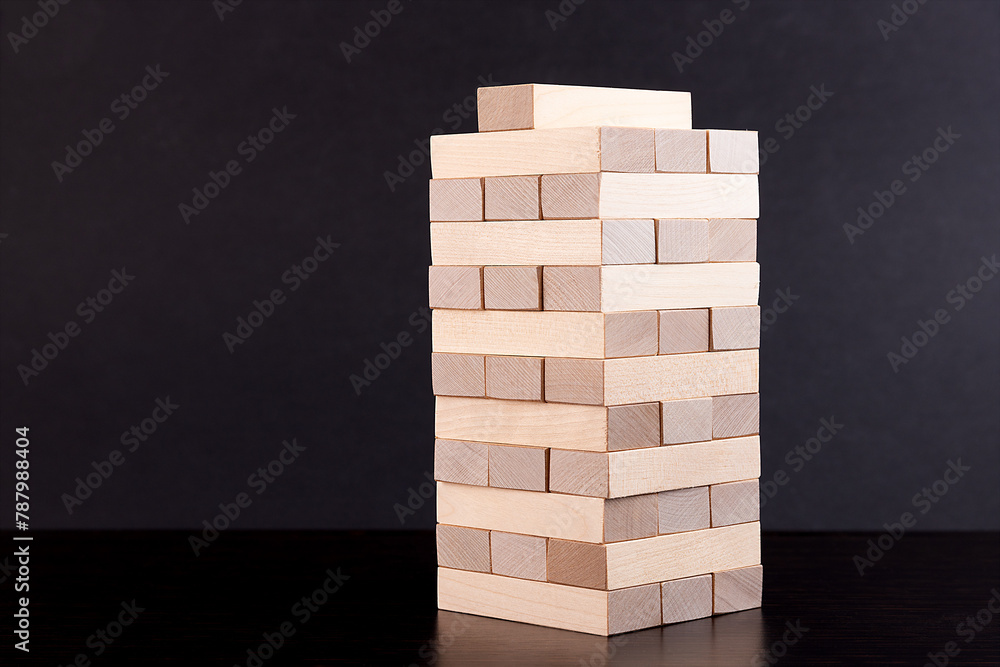 Blocks of wood on a dark background, Strategy game as a business plan ...