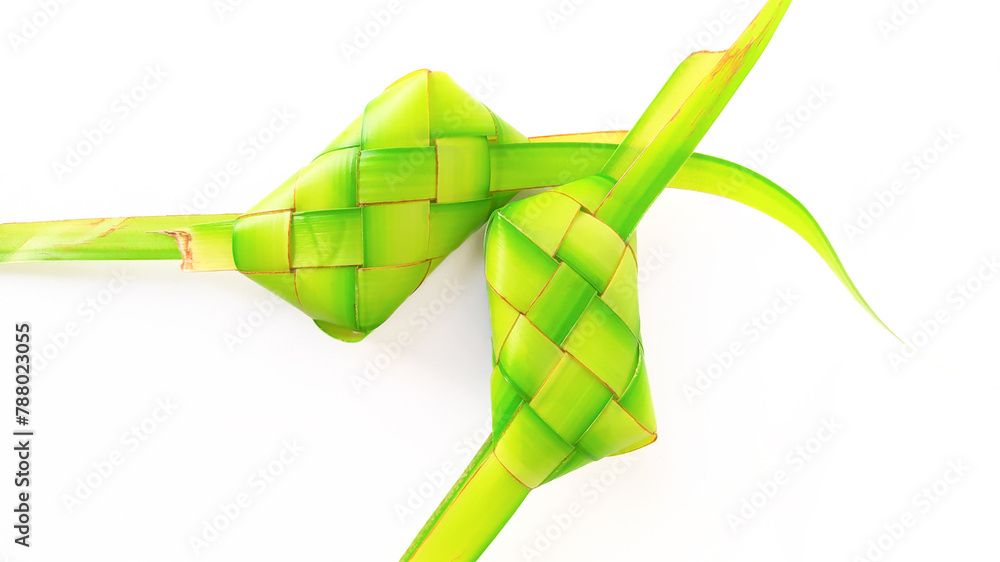 Ketupat pillow or Diamond rice Eid specialty food isolated on a white background, in indonesia ...