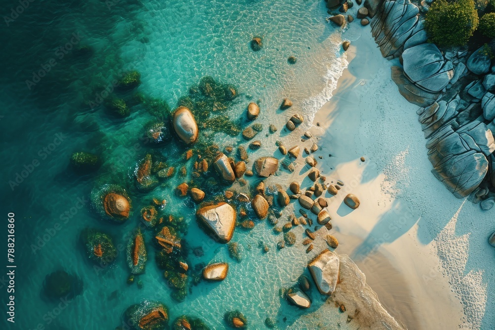 This photo captures an expansive aerial view of a beach, showcasing the ...