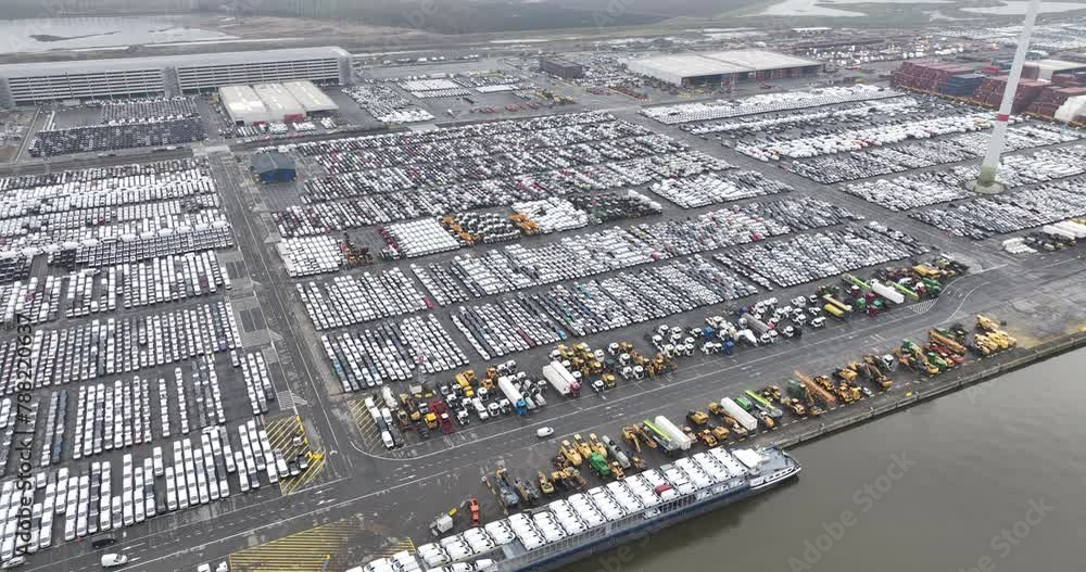 Aerial top down drone views of transportation of vehicles over seas ...