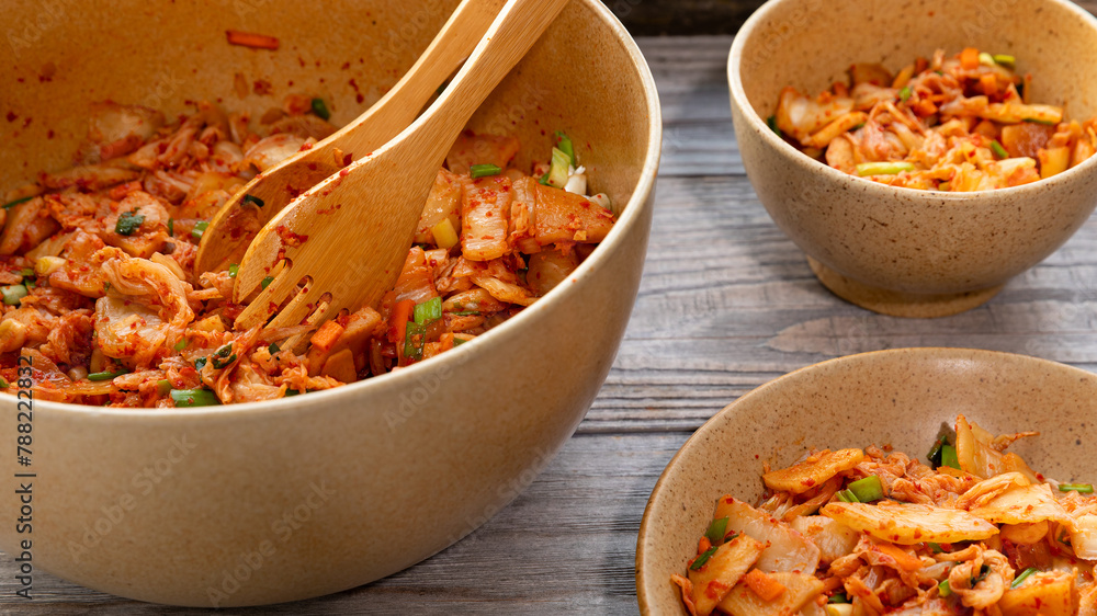 Serving kimchi, a traditional Korean side dish of salted and fermented ...