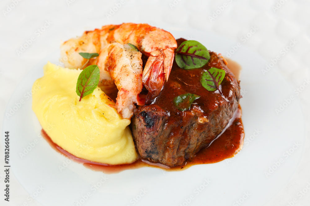 Surf and turf dish. Photo with a surf and turf gourmet plate made from ...