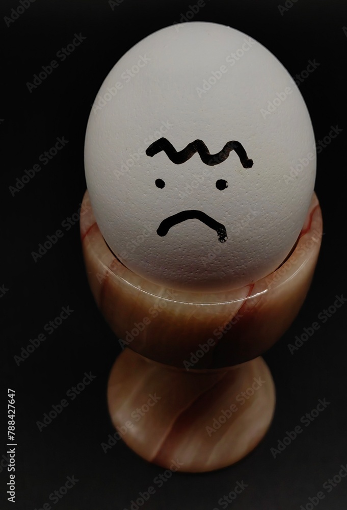 Sad White Egg, in brown marble mini cup. Emotions on Black Canvas ...
