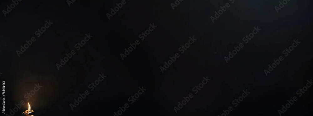 A dark black background, a small bright light at the bottom left corner ...