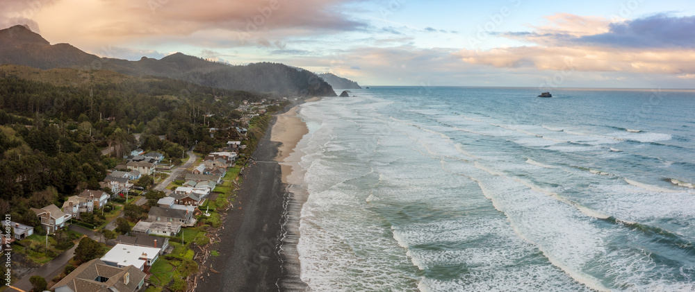 Aerial drone view of Arch Cape, Oregon. Arch Cape State Park features a ...